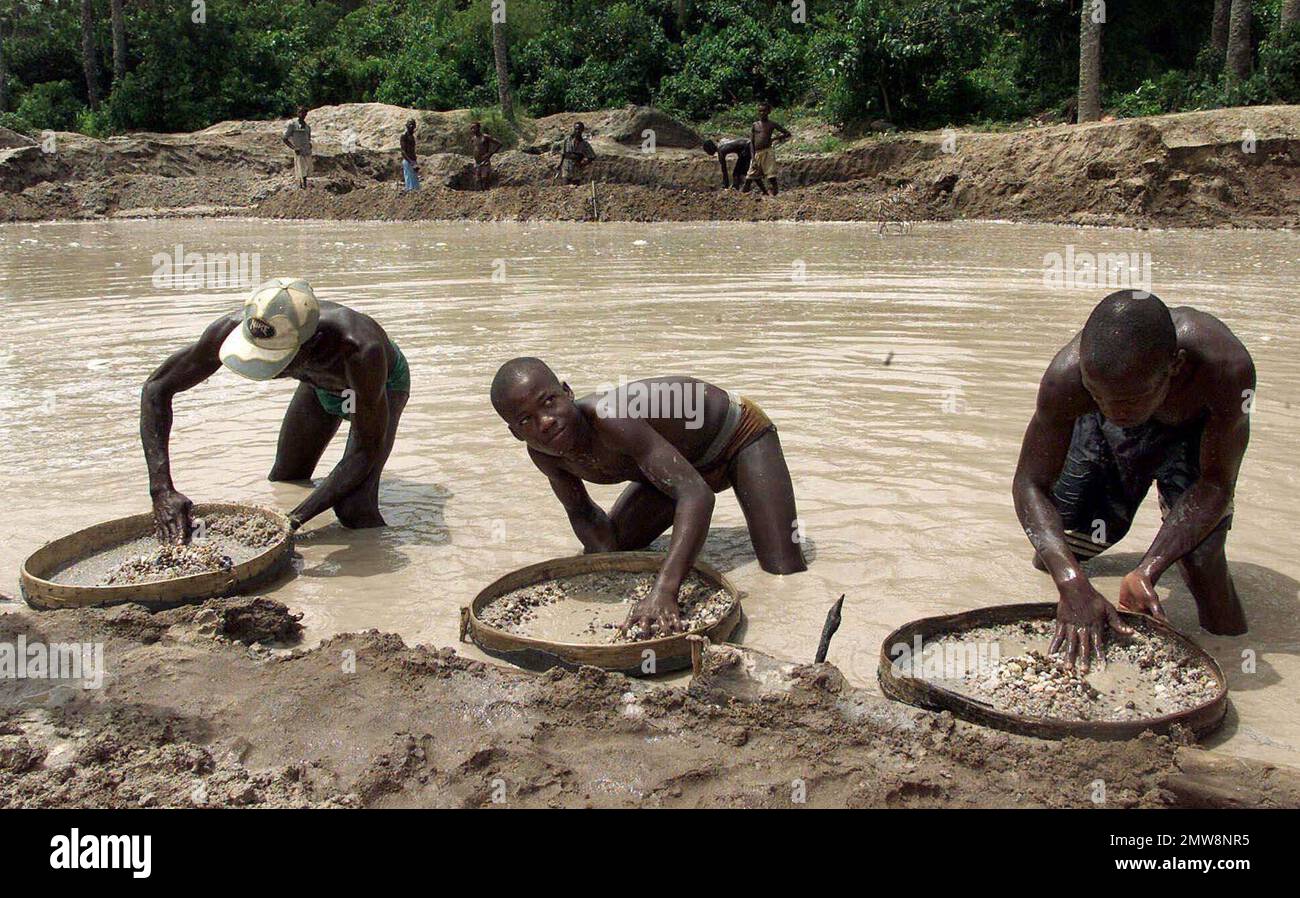 FILE- In this Wednesday May. 24, 2000 file photo, diamond prospectors ...