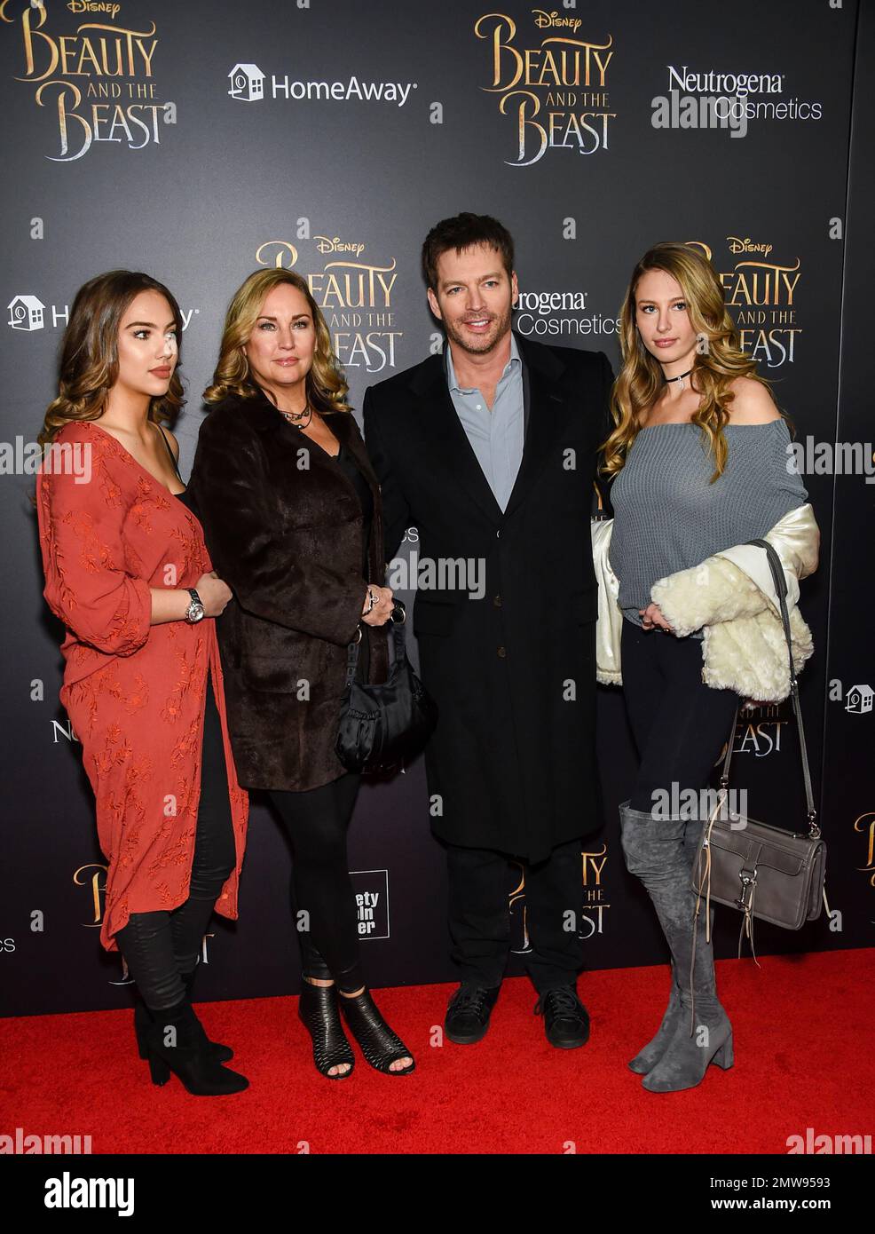 Television personality and singer Harry Connick jr. poses with his wife ...