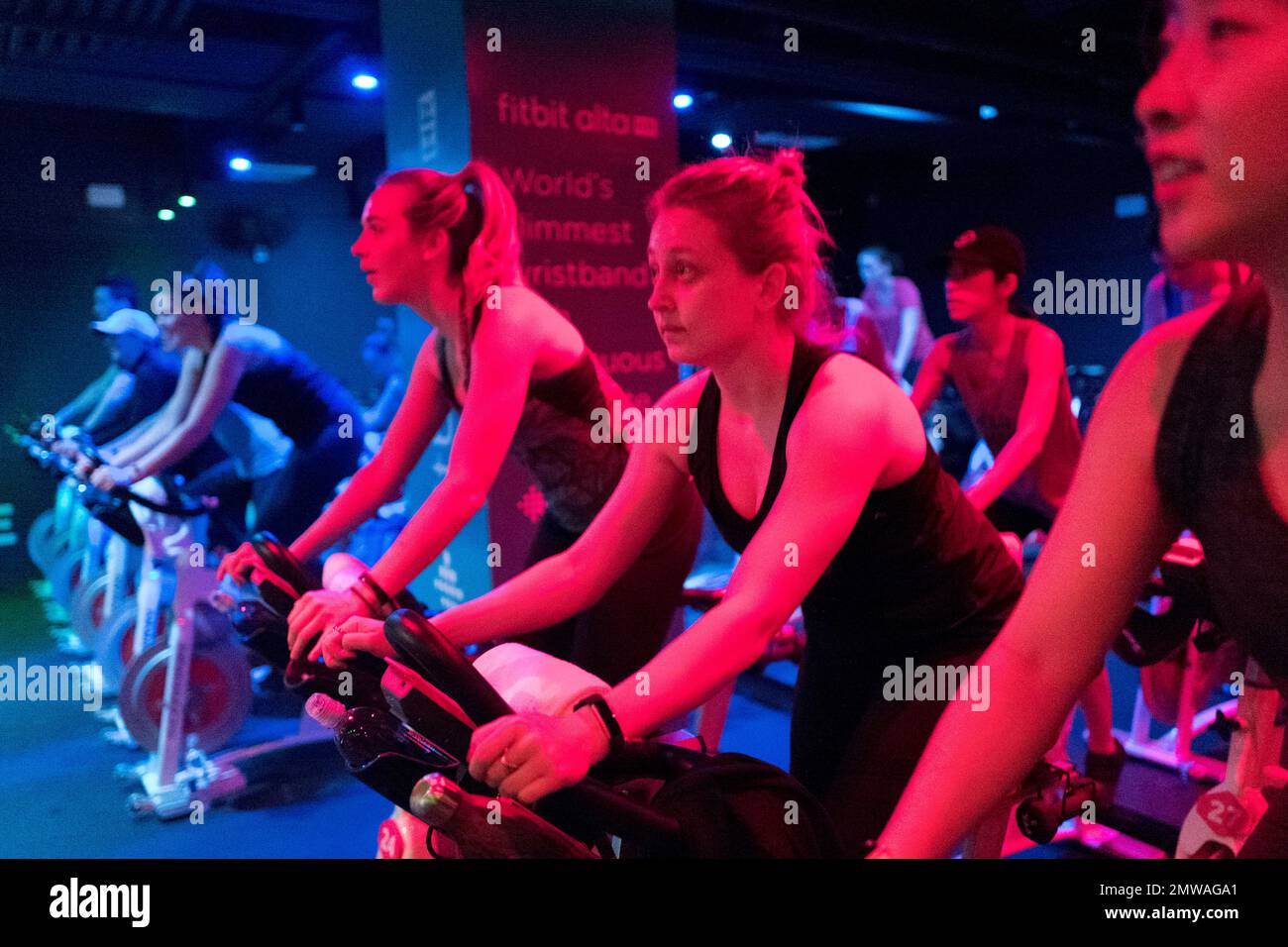 In this March 1, 2017 photo, women wear Fitbit's new Alta HR on their ...