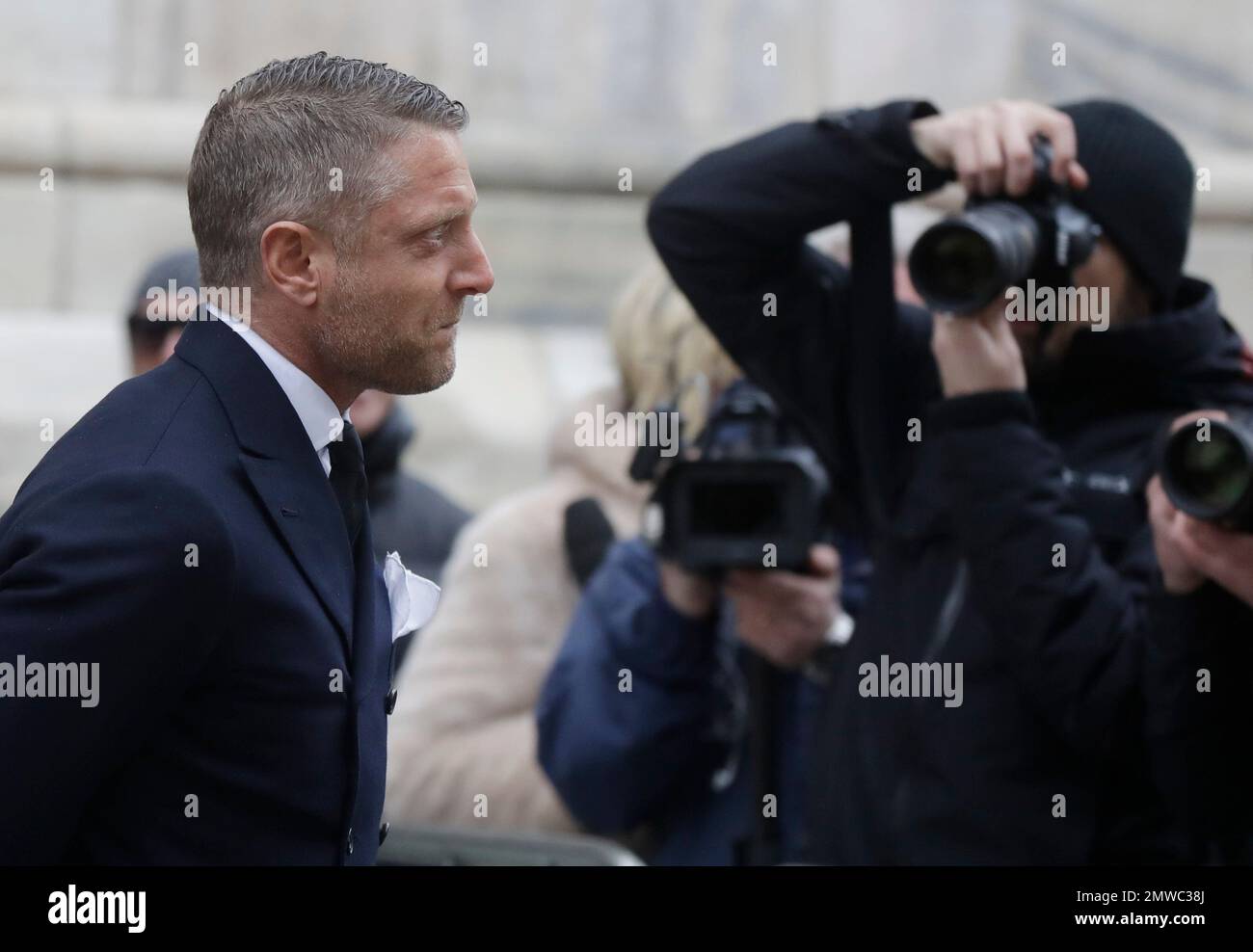Lapo Elkann leaves the Duomo gothic cathedral after attending a ...