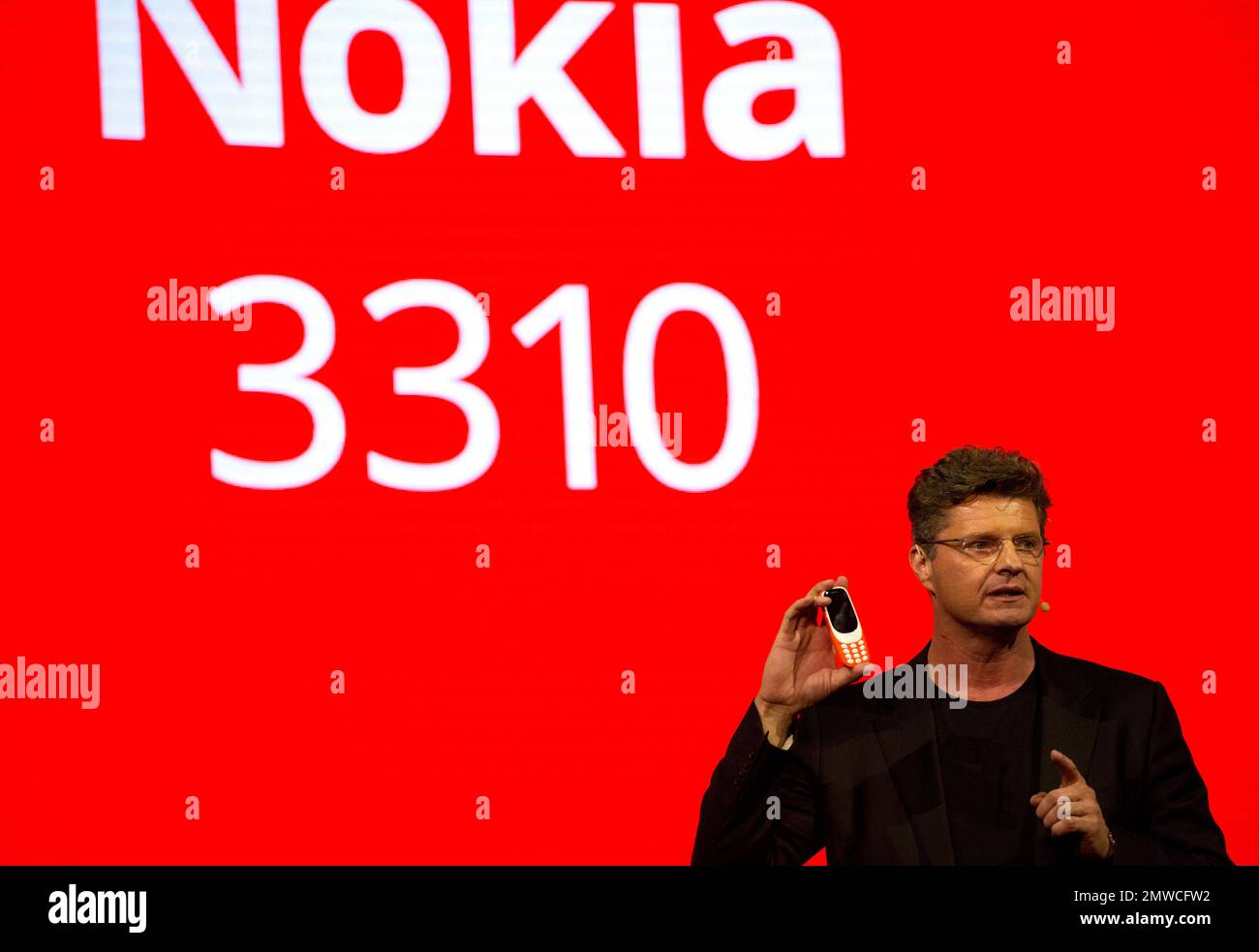 Arto Nummela, Chief Executive Officer at HMD Global, shows the new re ...