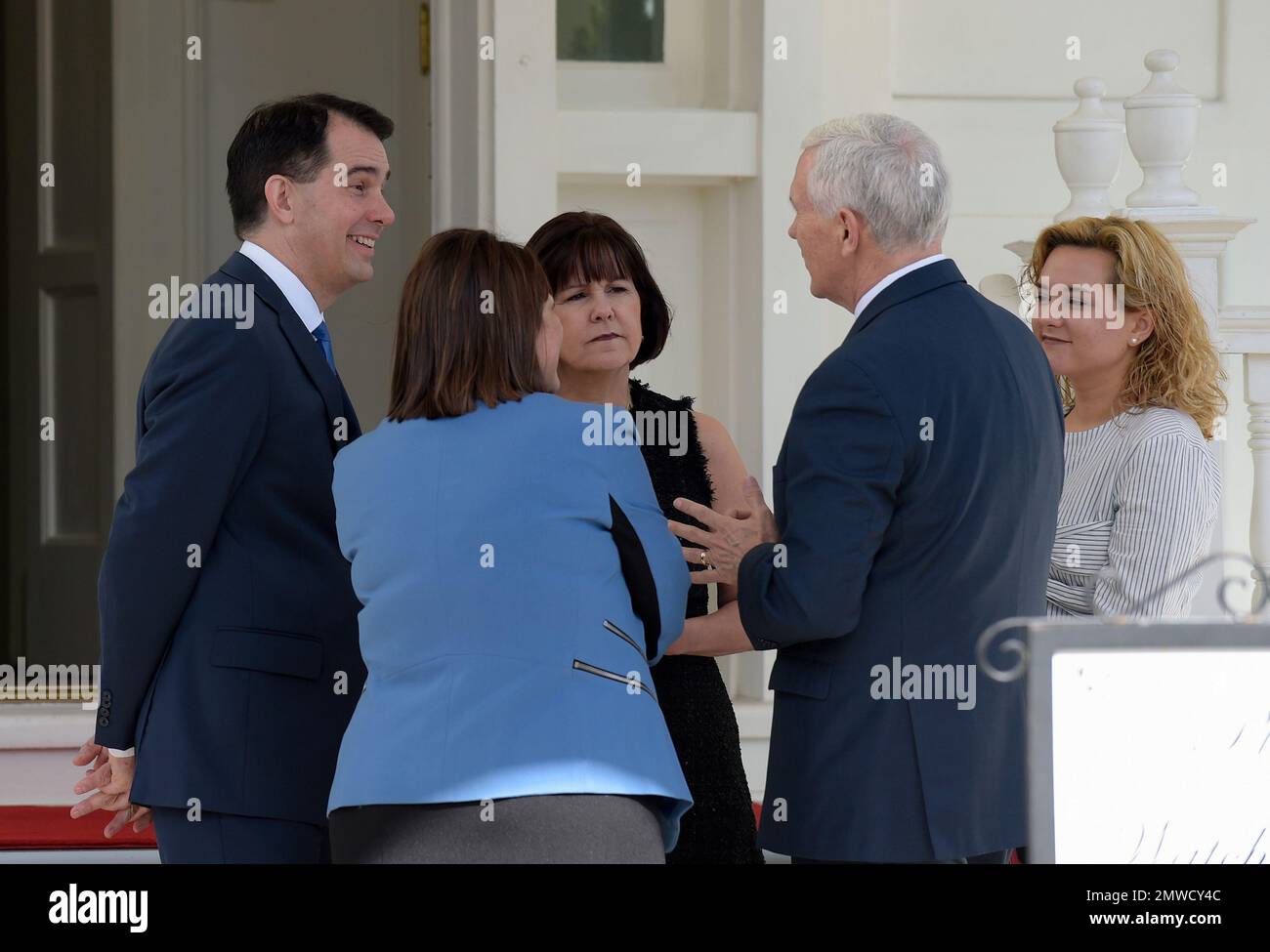Wisconsin Gov. Scott Walker, left, and his wife Tonette Walker, second ...