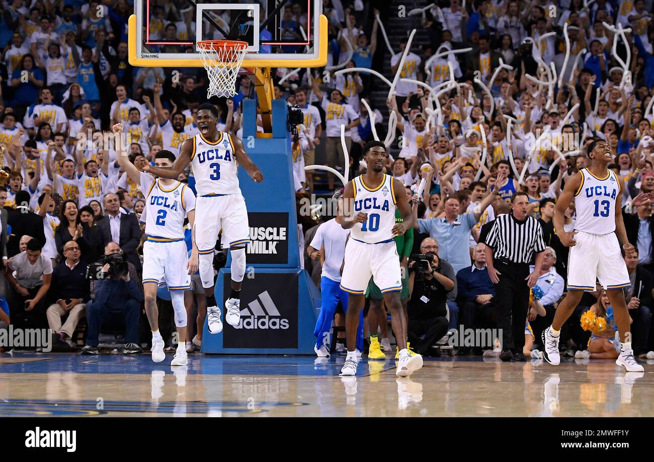 Members of UCLA, from left, guard Lonzo Ball, guard Aaron Holiday ...