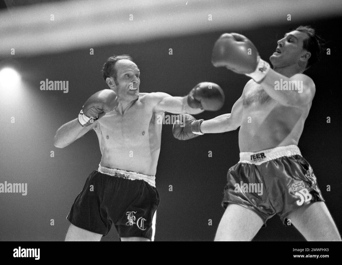 Henry Cooper, heavyweight boxing champion of the Commonwealth, left ...