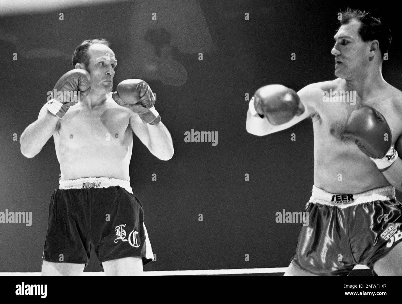 Henry Cooper, heavyweight boxing champion of the Commonwealth, left ...