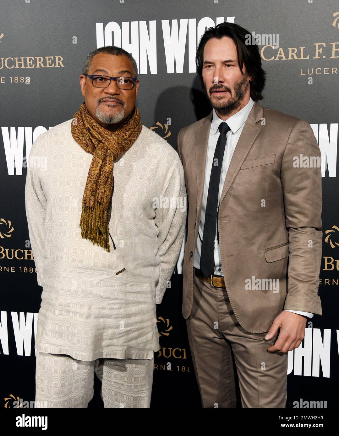 Laurence Fishburne, left, and Keanu Reeves, cast members in "John Wick ...
