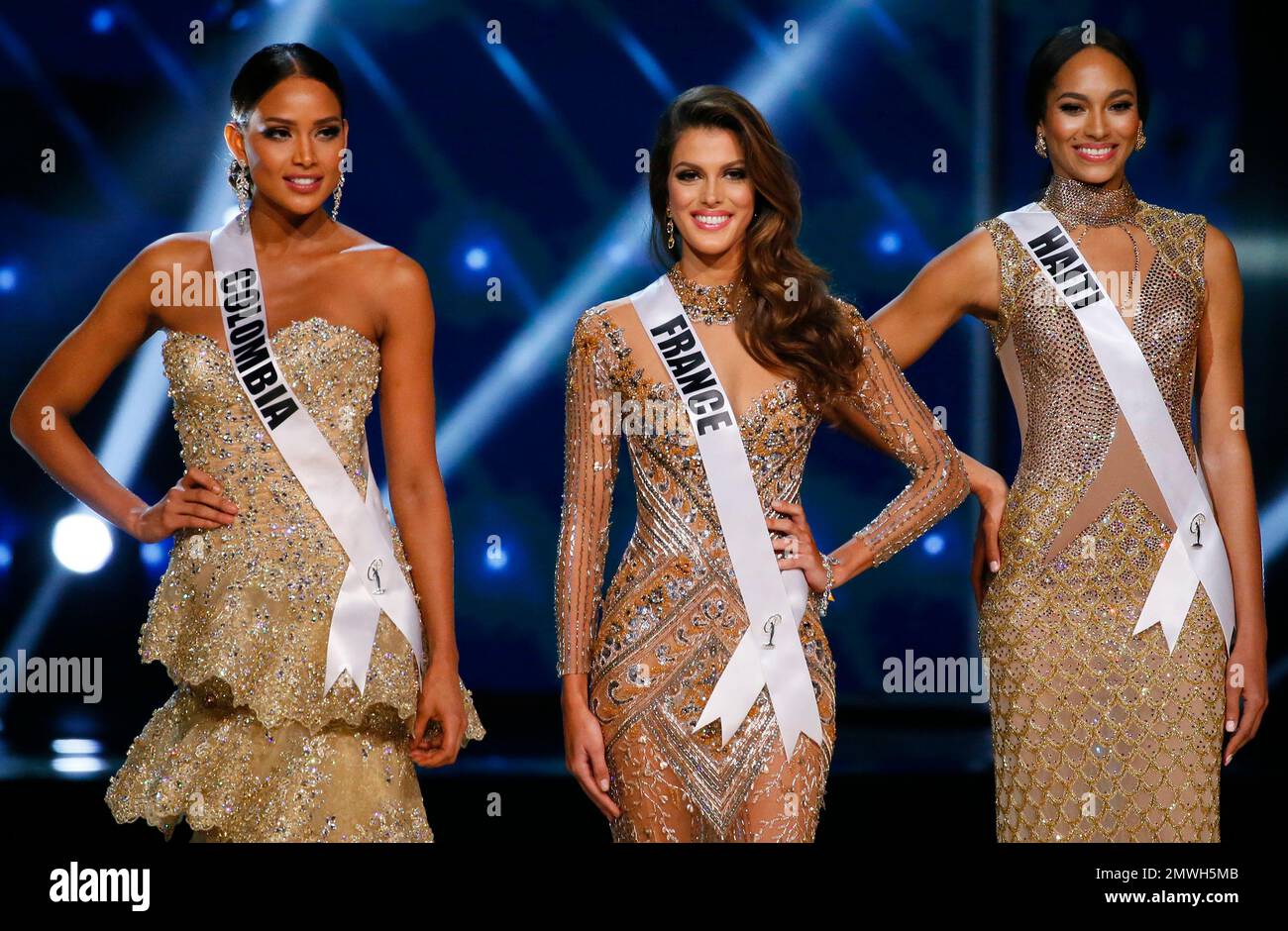 Andrea Tovar of Colombia, left, Iris Mittenaere of France, center, and ...