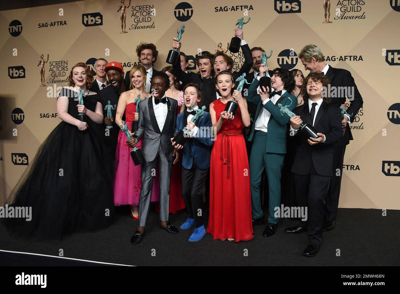 The cast and crew of "Stranger Things" pose in the press room with the ...