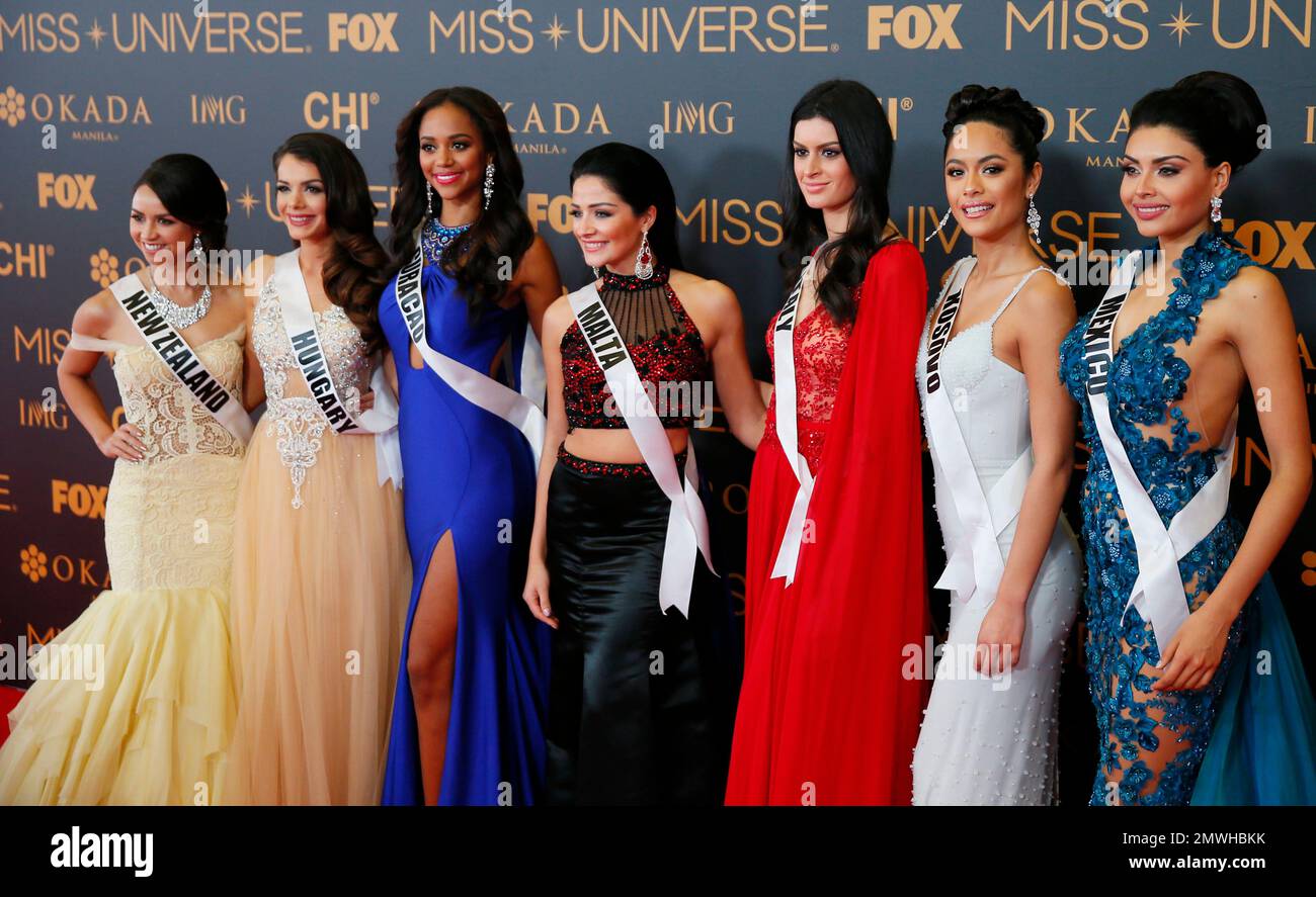 Miss Universe contestants pose on the red carpet on the eve of their ...