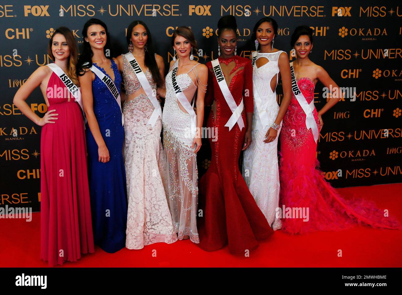 Miss Universe contestants pose on the red carpet on the eve of their ...