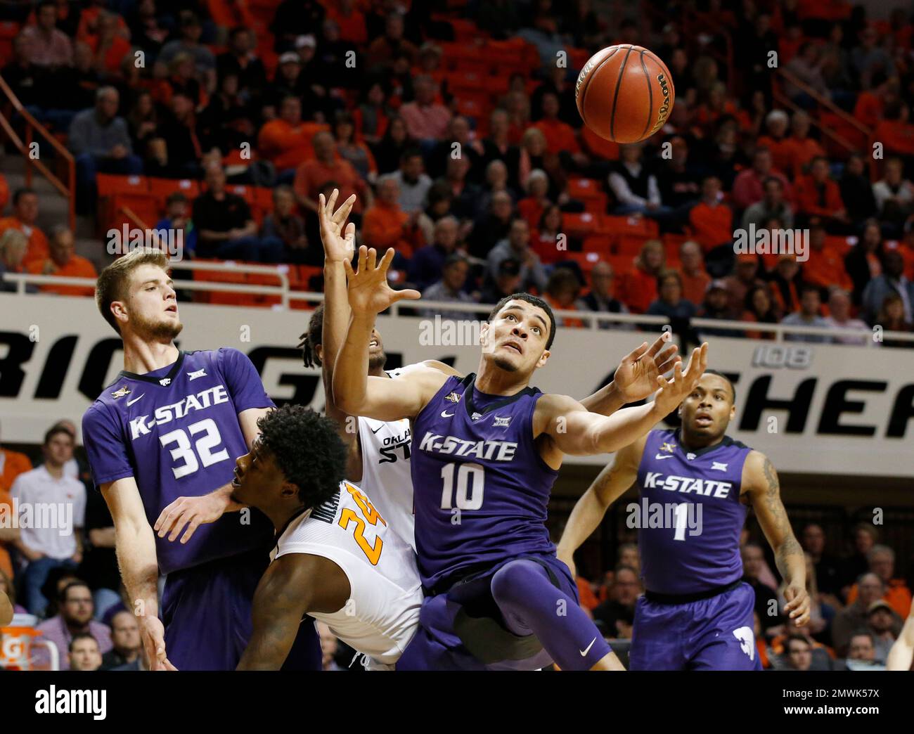 Kansas State forward Isaiah Maurice (10) reaches for a rebound in front ...