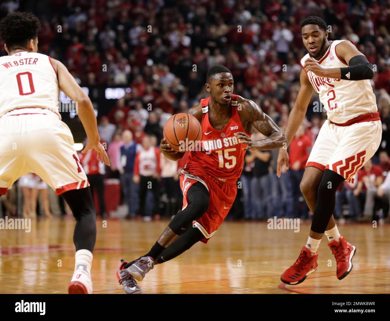 Ohio State's Kam Williams (15) drives to the basket between Nebraska's ...