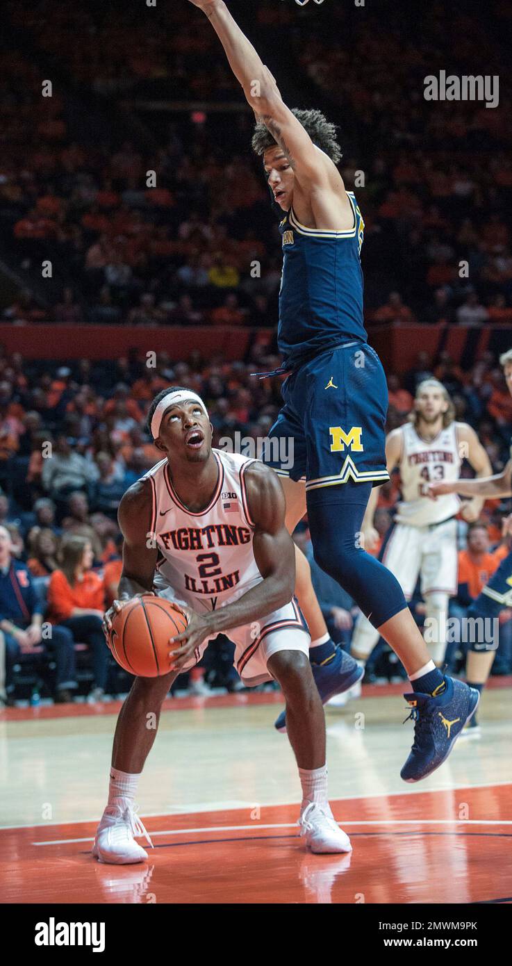 Illinois forward Kipper Nichols (2) looks to shoot as Michigan forward ...