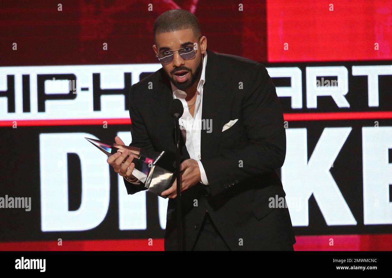 FILE - In this Nov. 20, 2016, file photo, Drake accepts the award for ...