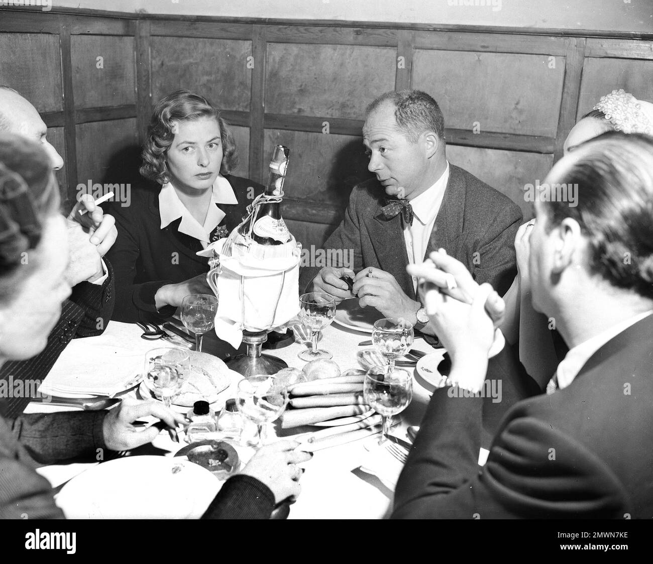Hollywood screen director Billy Wilder and actress Ingrid Bergman dine ...