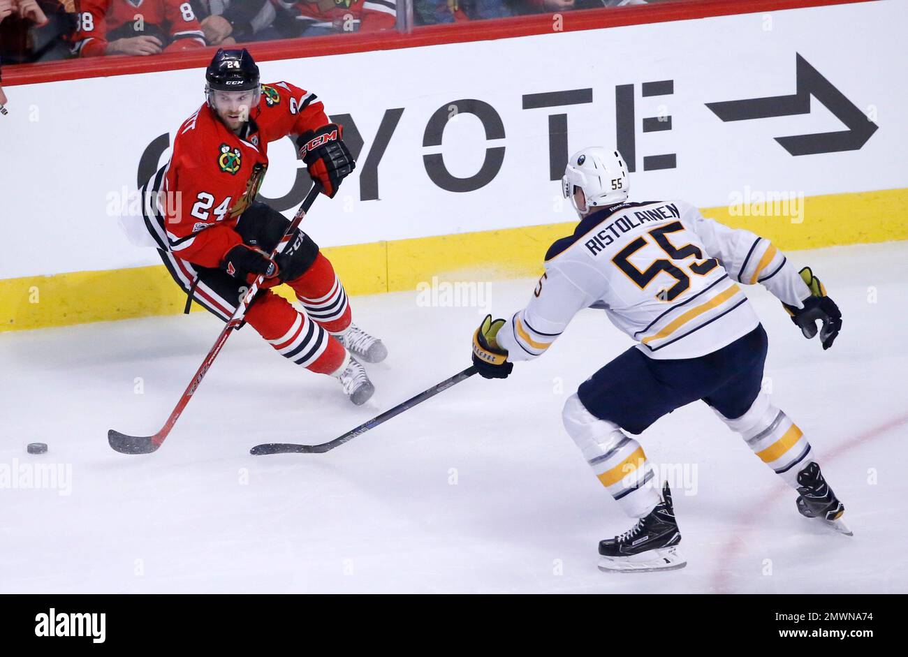 Chicago Blackhawks' Spencer Abbott (24) advances the puck during as Buffalo Sabres' Rasmus ...