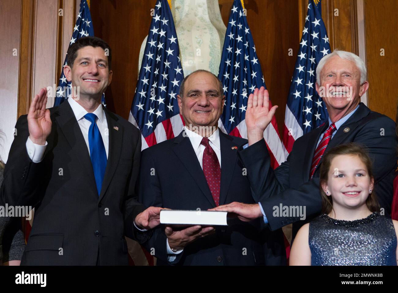 House Speaker Paul Ryan of Wis. administers the House oath of office to Rep. Jack Bergman, R ...