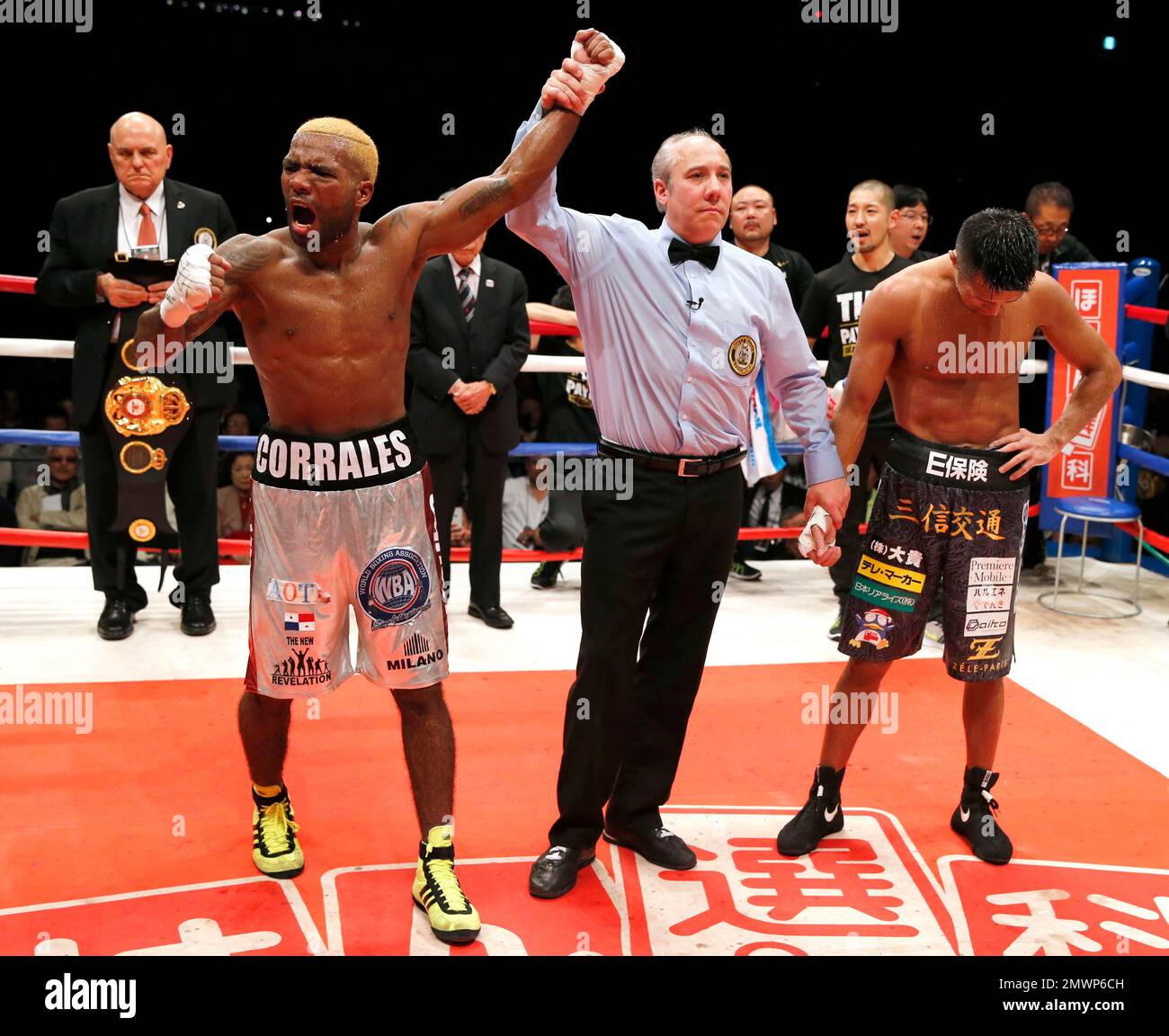 Panamanian champion Jezreel Corrales, left, reacts after being declared ...