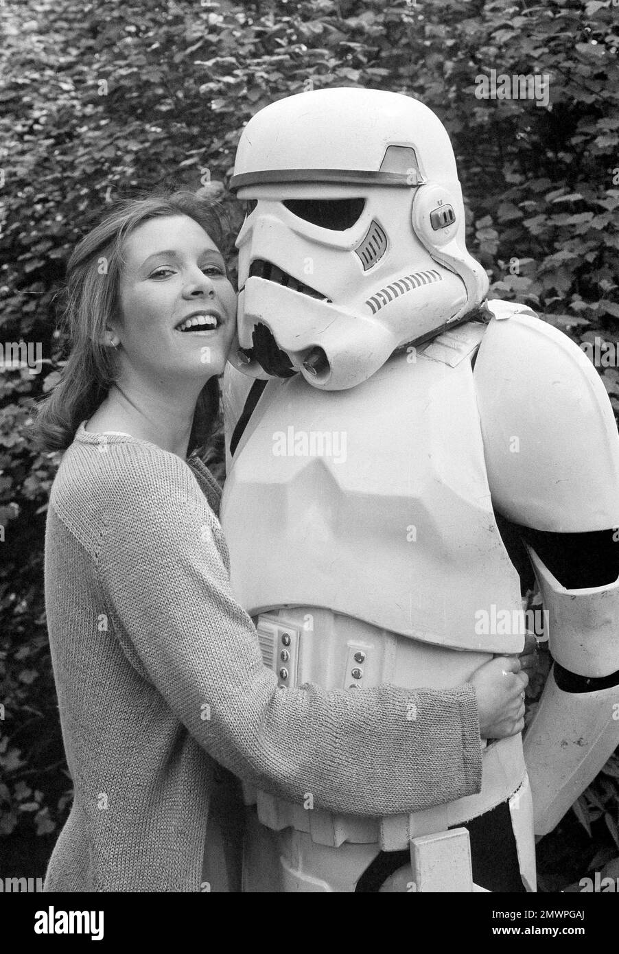 FILE- In this May 23, 1980, file photo, actress Carrie Fisher hugs a ...