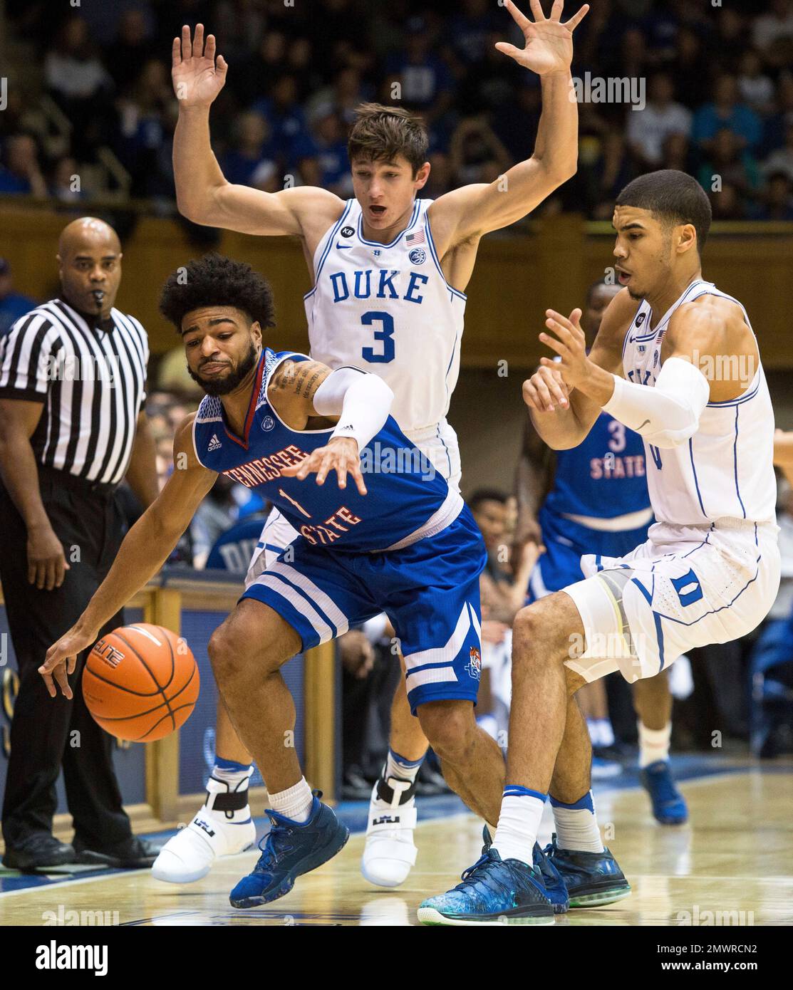Tennessee State's Delano Spencer (1) loses the ball as Duke's Grayson ...
