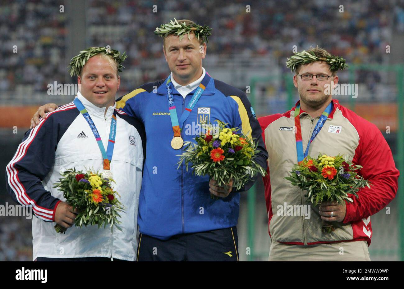 FILE - In this Aug. 20, 2004, file photo, shot put medalists of the ...