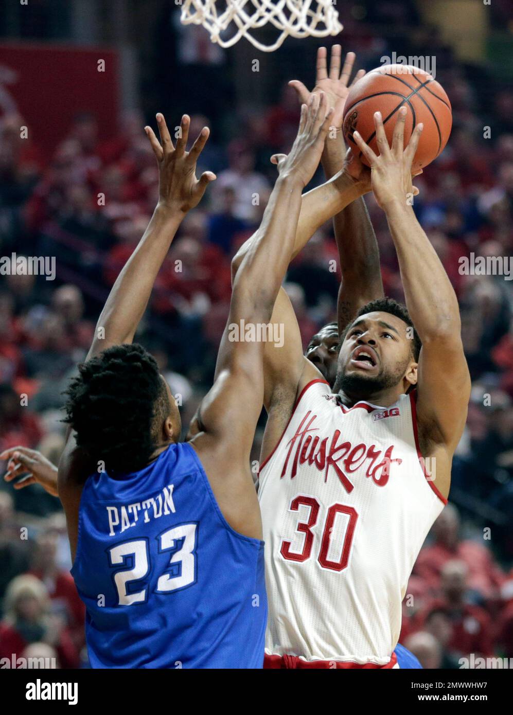 Nebraska's Ed Morrow (30) is defended by Creighton's Justin Patton (23 ...