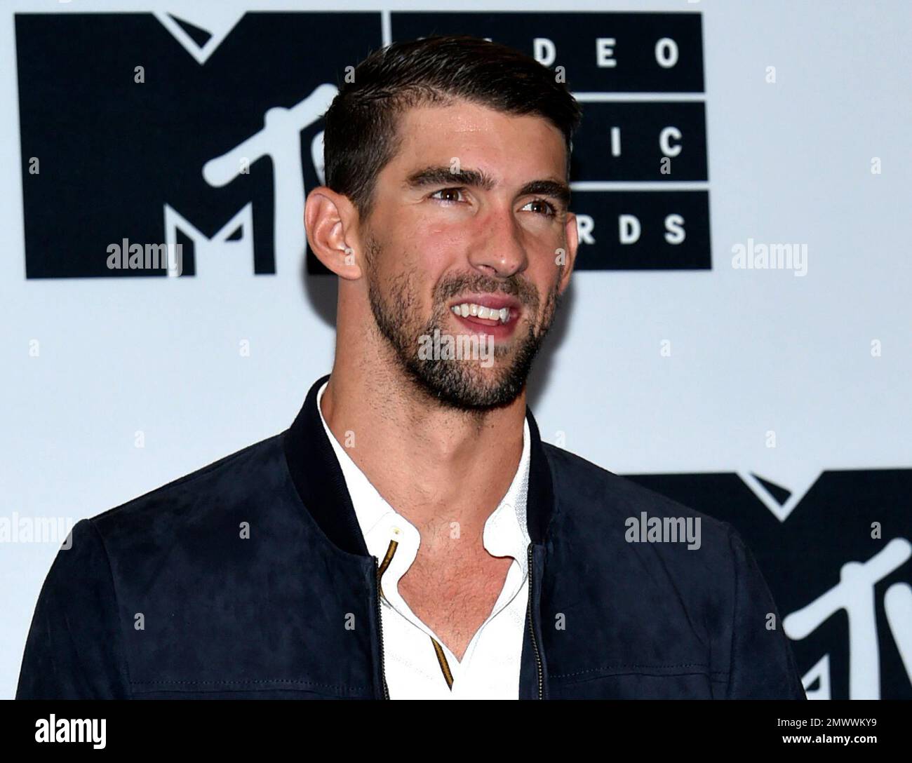 FILE - In this Aug. 28, 2016 file photo, Michael Phelps poses in the ...
