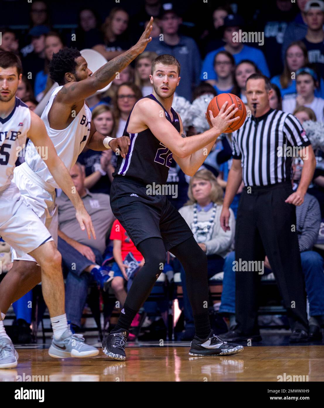 Central Arkansas forward Tanner Schmit (22) looks for a teammate's help ...