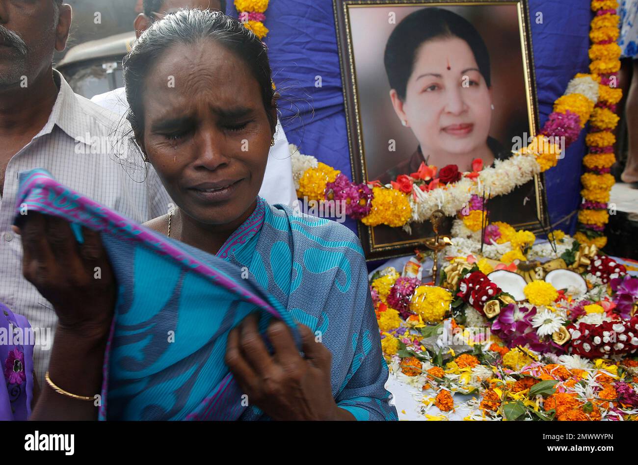A supporter of India's Tamil Nadu state's former Chief Minister ...