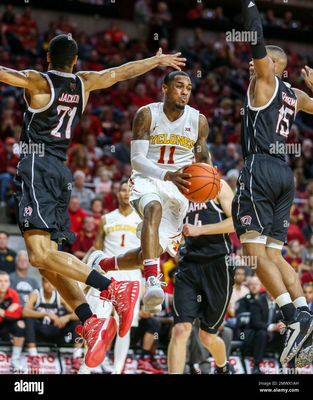 Iowa State guard Monte Morris goes between Nebraska-Omaha guard Zach ...