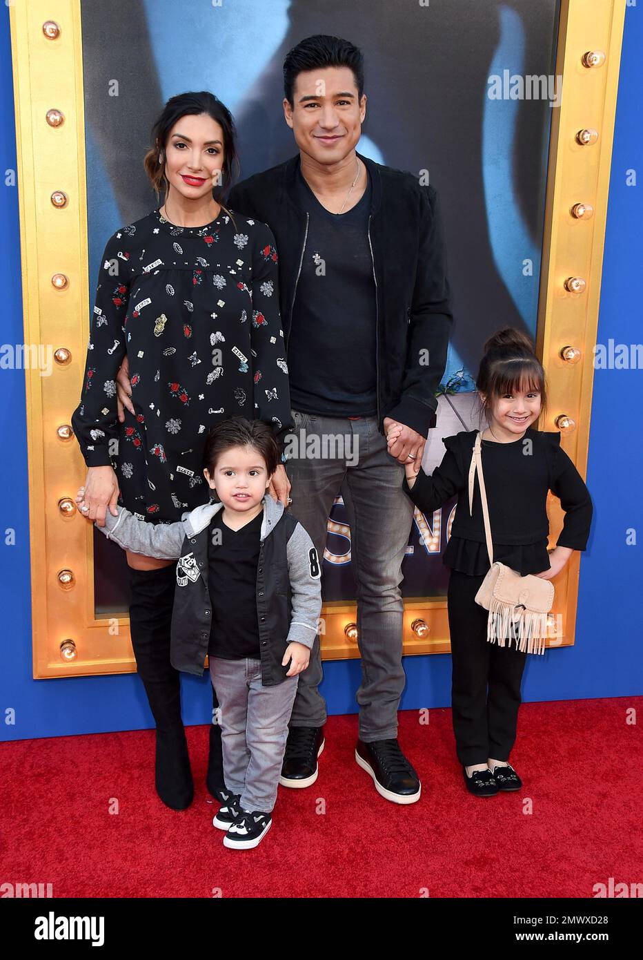 Courtney Mazza, left, Mario Lopez, second right, and their children ...