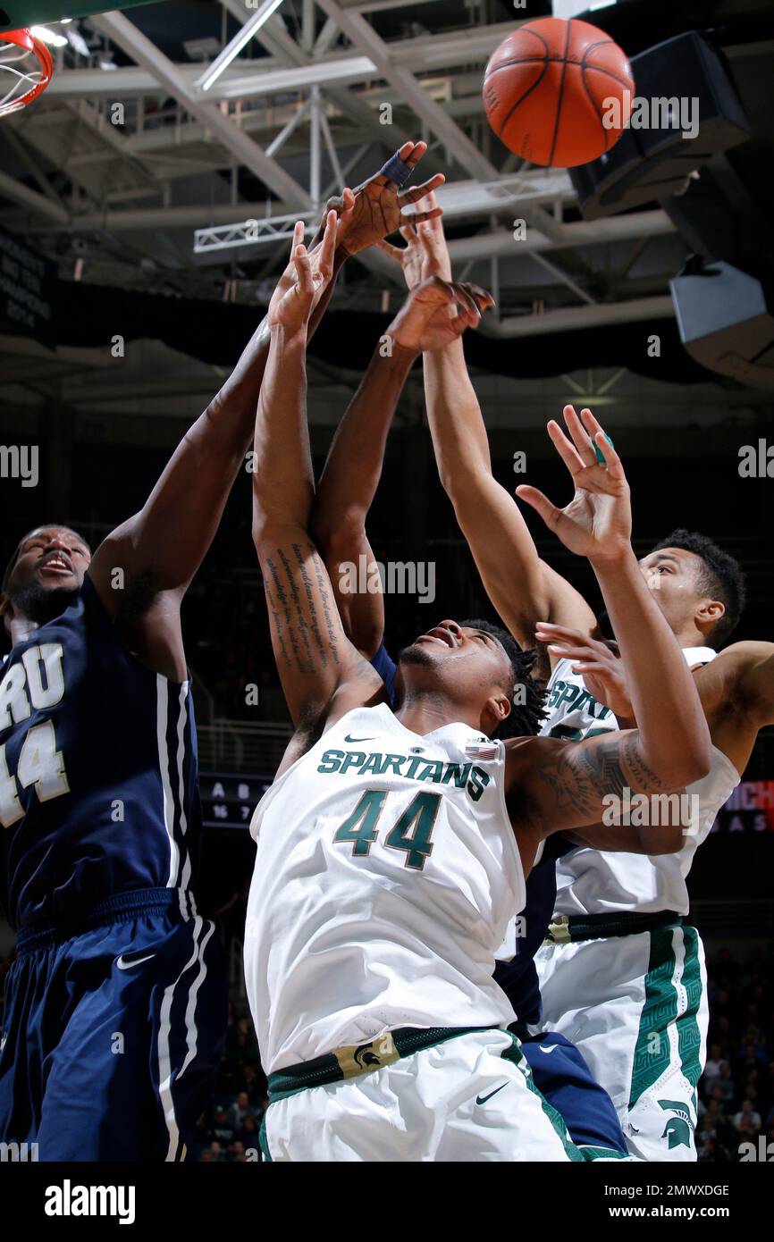 Michigan State's Nick Ward (44) and Kenny Goins, right, and Oral ...