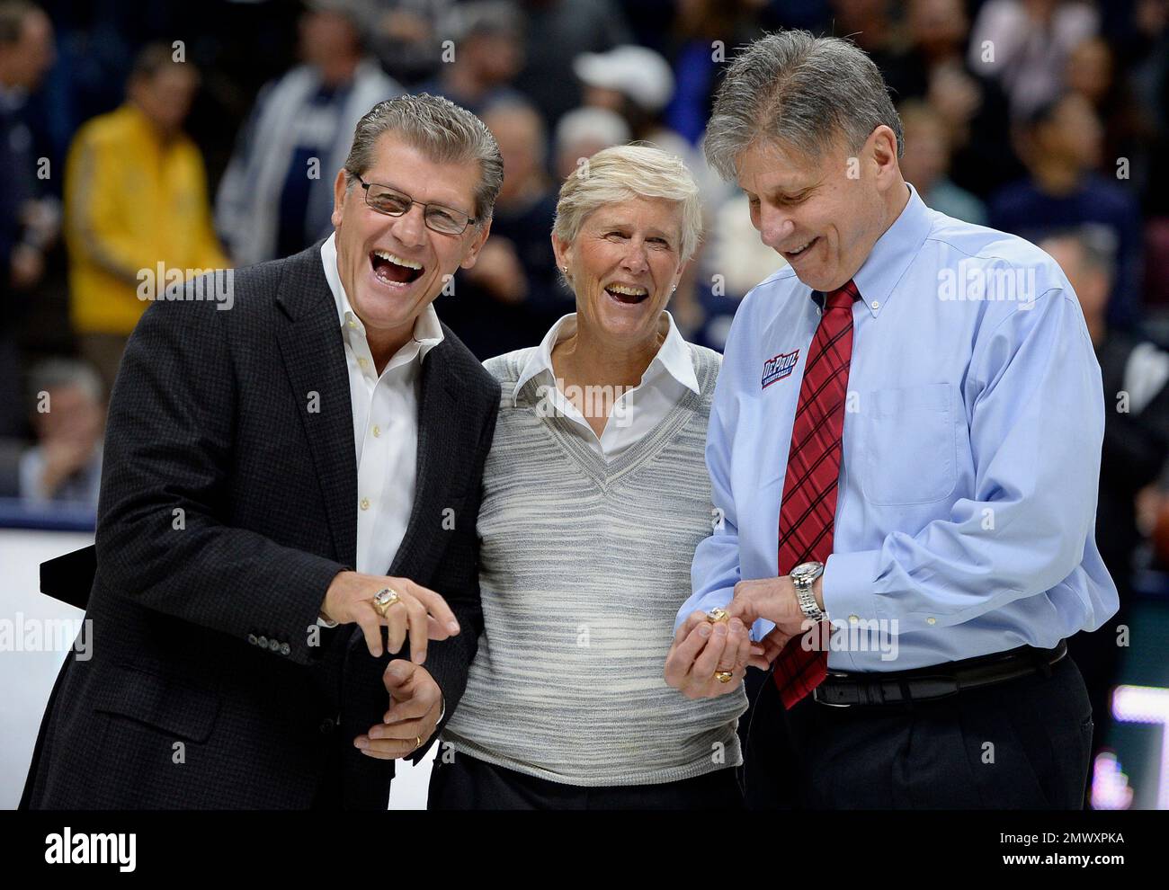 Connecticut head coach Geno Auriemma, left, and DePaul head coach Doug ...