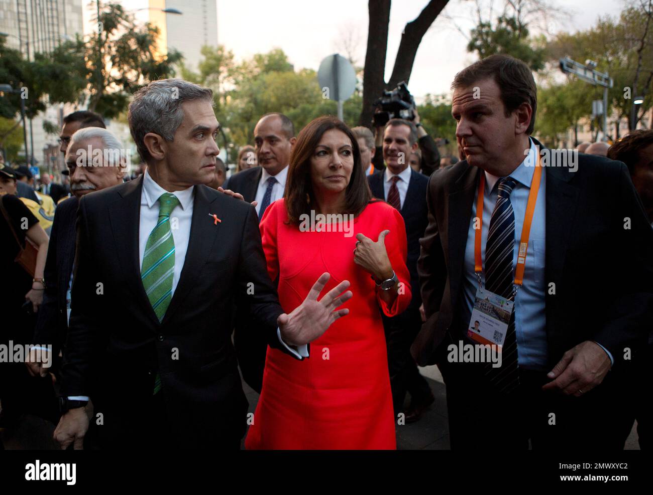 Mexico City Mayor Miguel Angel Mancera, left, speaks with Paris Mayor ...