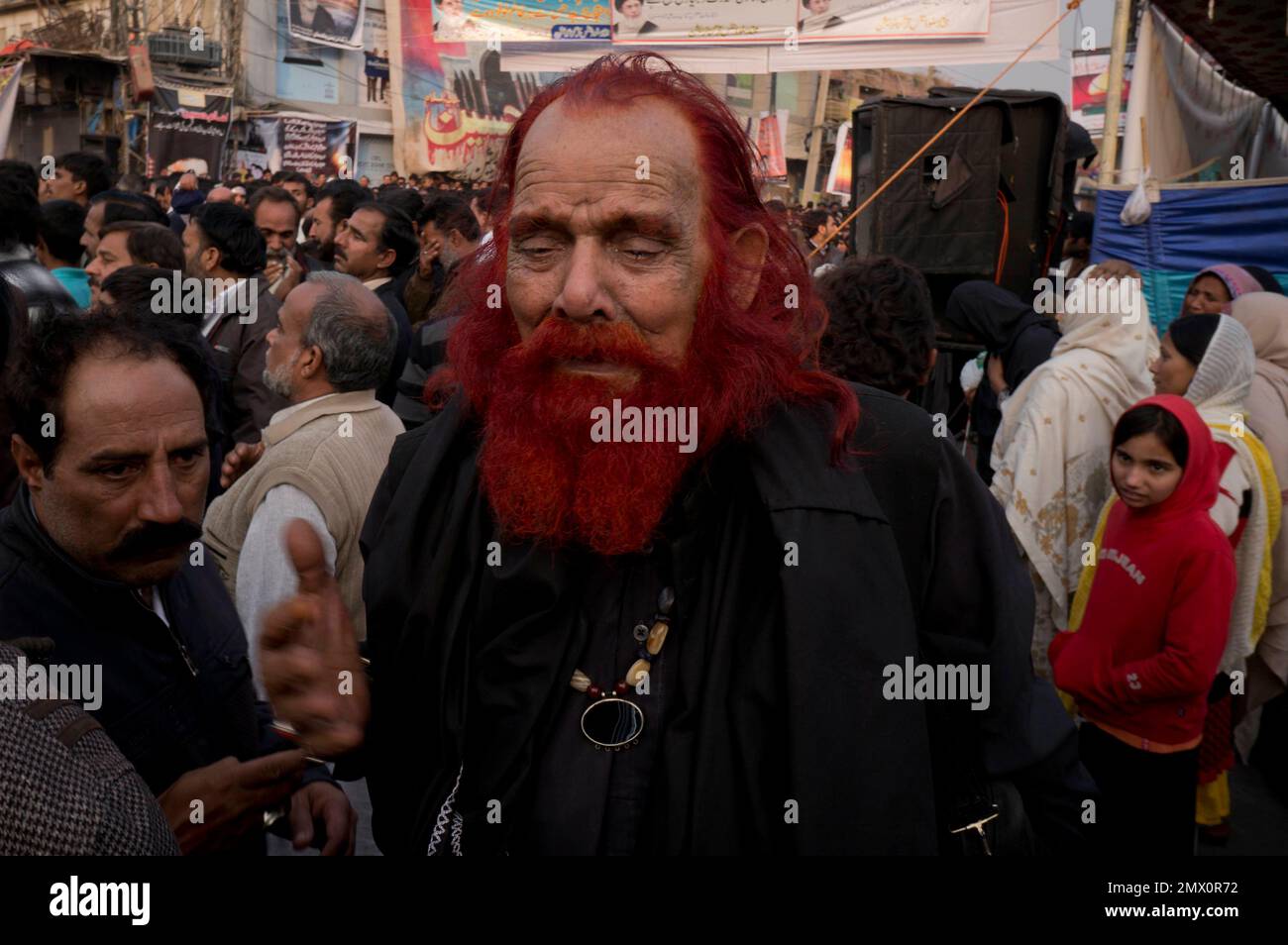 A Pakistani Shiite Muslim mourns during a procession to mark the end of ...