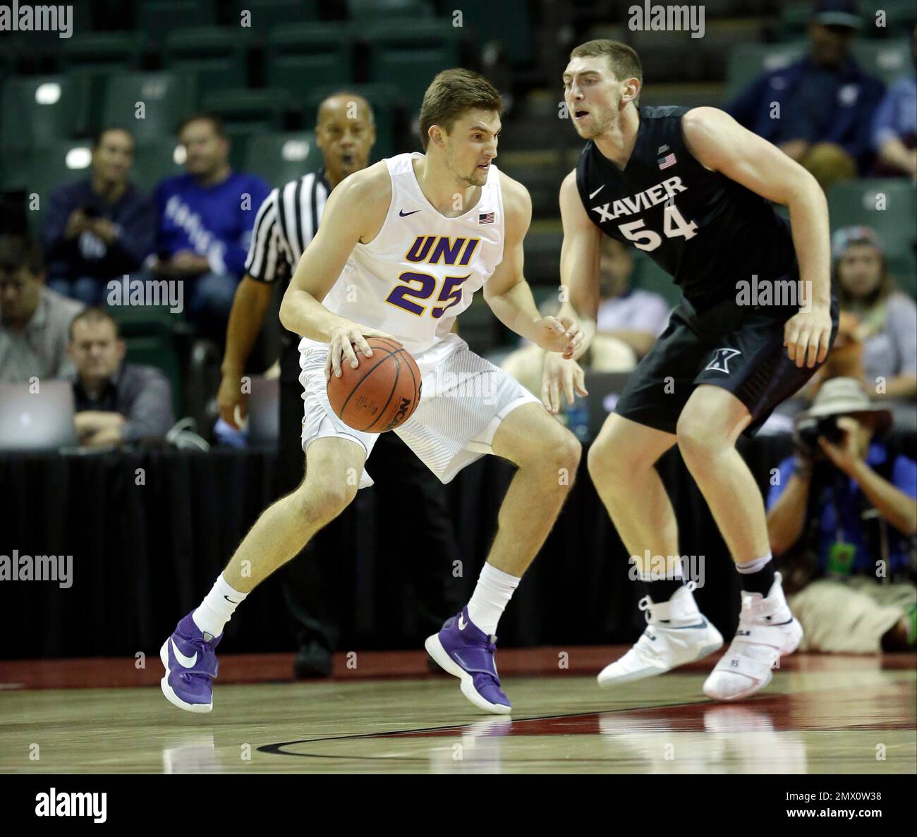 Northern Iowa's Bennett Koch (25) drives to the basket against Xavier's ...