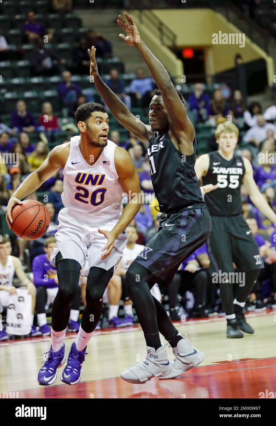 Northern Iowa's Jeremy Morgan (20) looks to pass the ball as he is ...