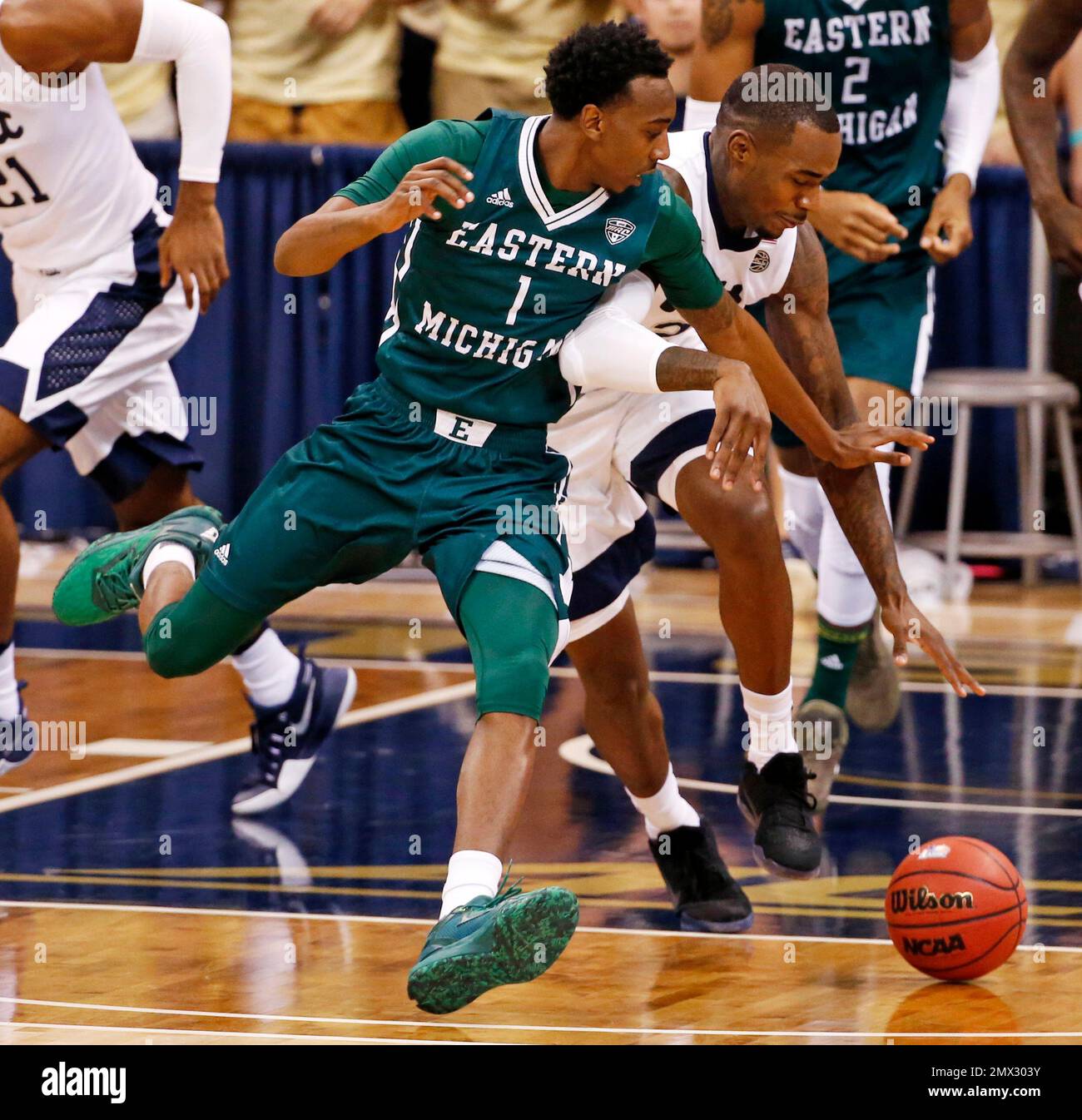 Pittsburgh forward Michael Young, right, battles for a loose ball with ...