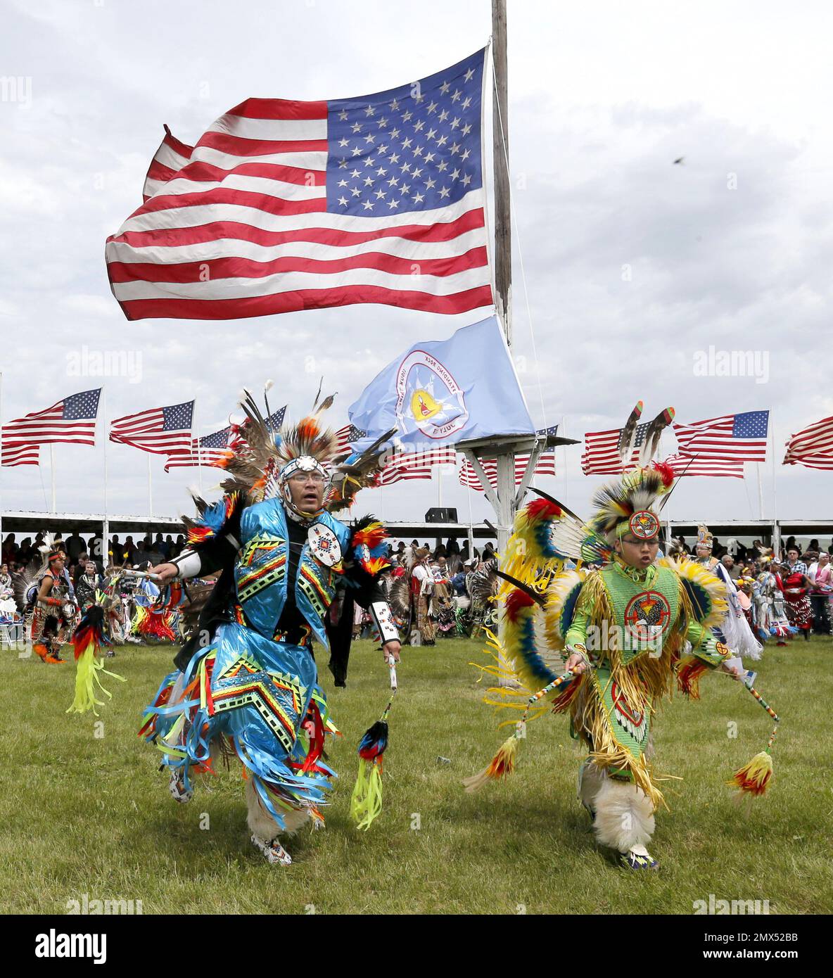 FILE - In this June 13, 2014, file photo, Native American dancers from ...