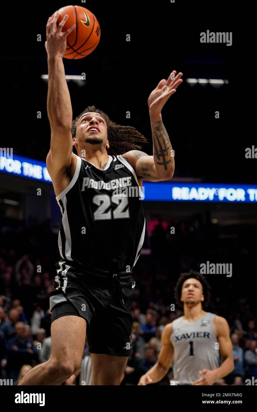 Providence guard Devin Carter (22) shoots during overtime of an NCAA ...
