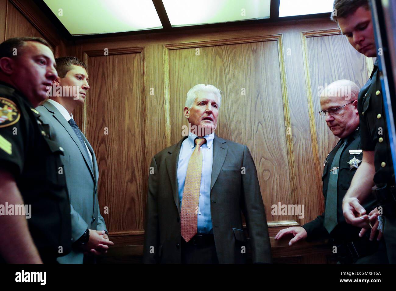 Ray Tensing, second from left, and his layer Stewart Mathews, center ...