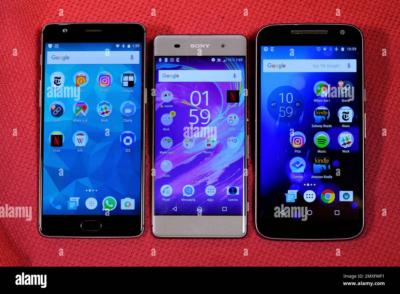 This Oct. 21, 2016, photo shows a Motorola MotoG4, right, a Sony Xperia ...