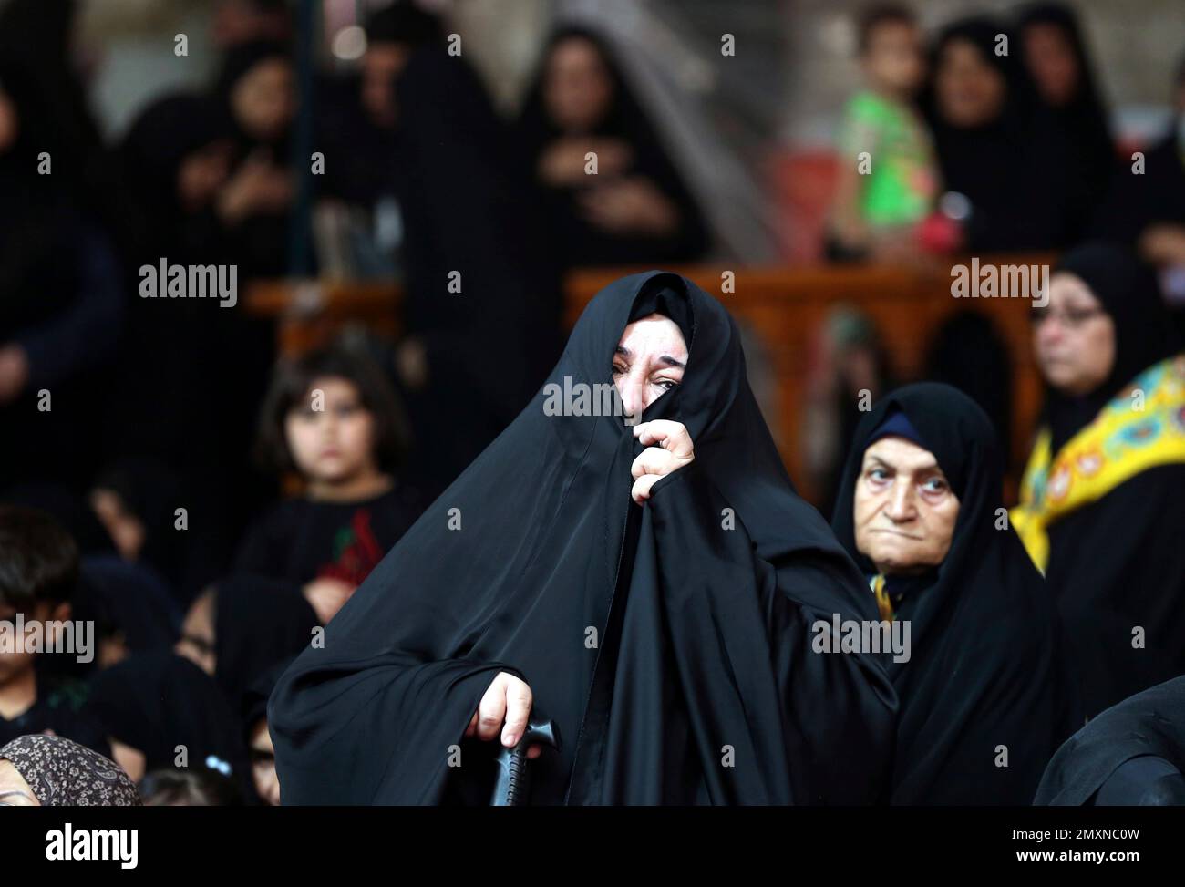 Shiite worshippers gather inside the shrine of Imam Abbas during ...