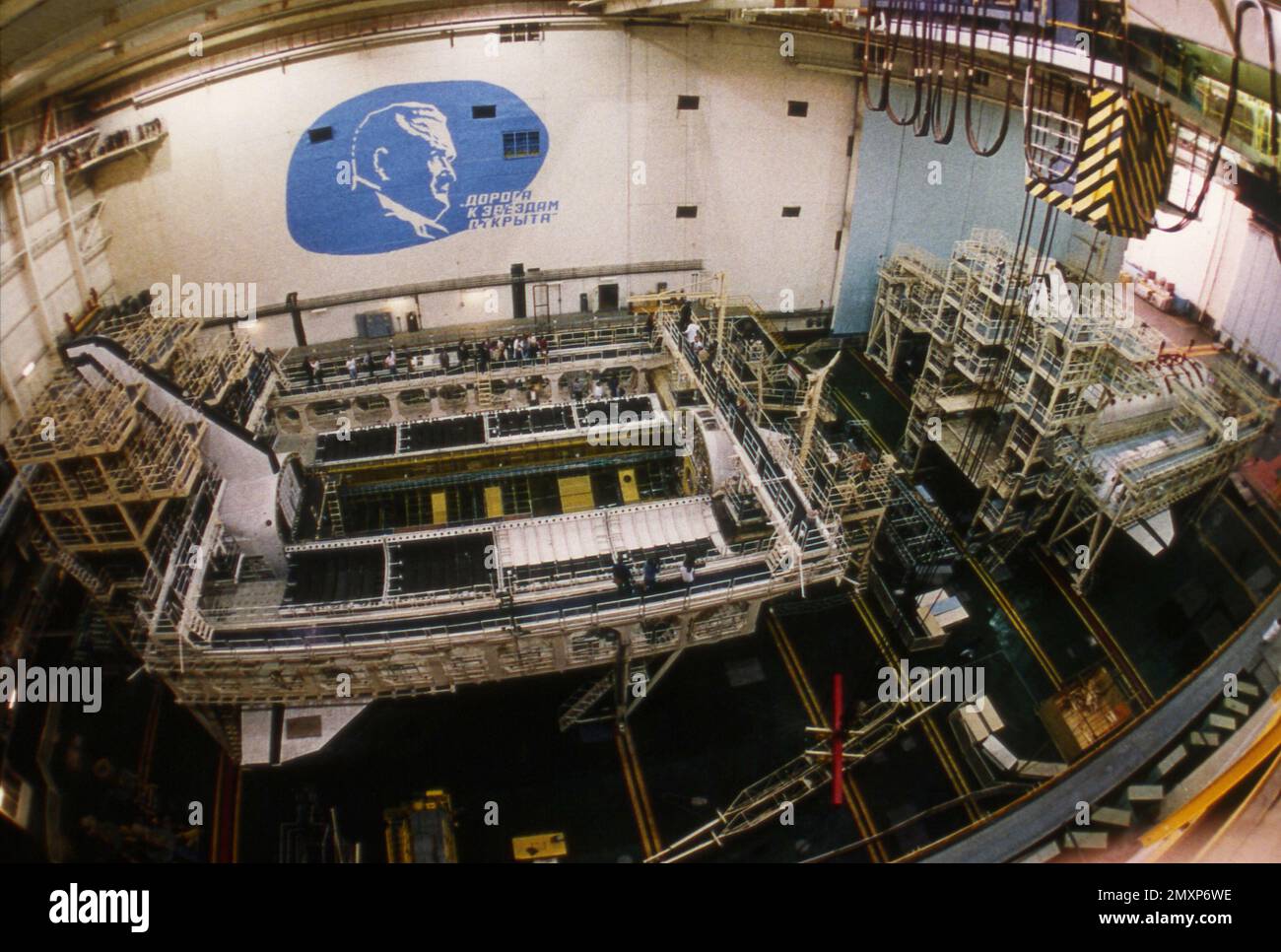 The Soviet space shuttle Buran, with it's payload bay doors open, is cradled in a maze of ...