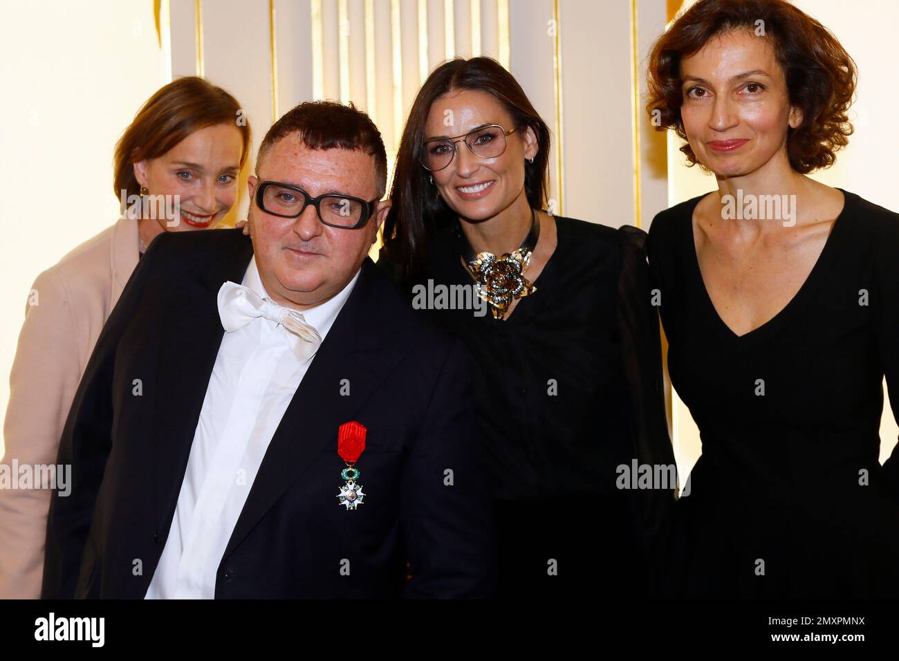 Israeli American fashion designer Alber Elbaz, second left, poses with ...