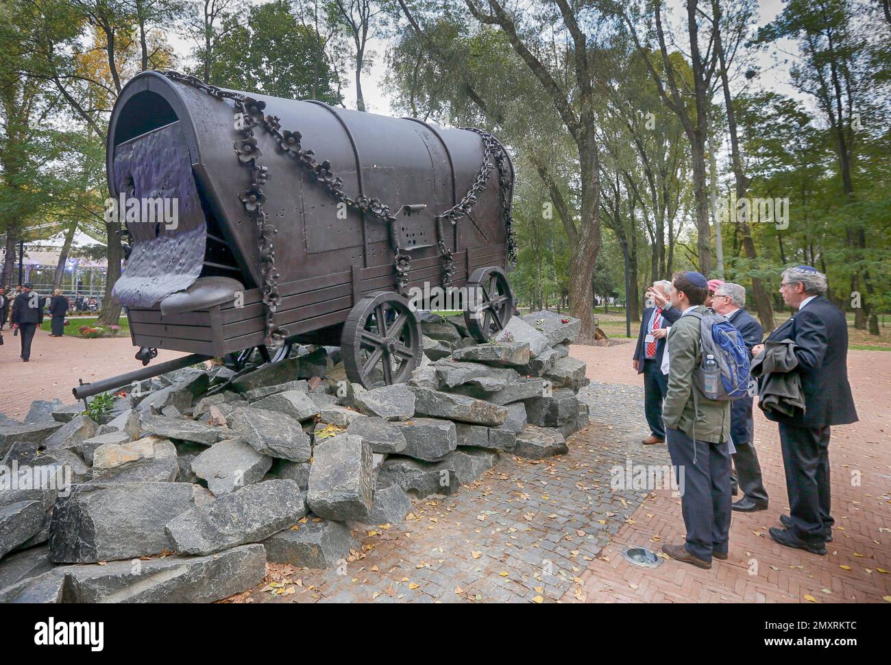 Visitors look at a monument to Gipsies killed in Babi Yar ravine where ...