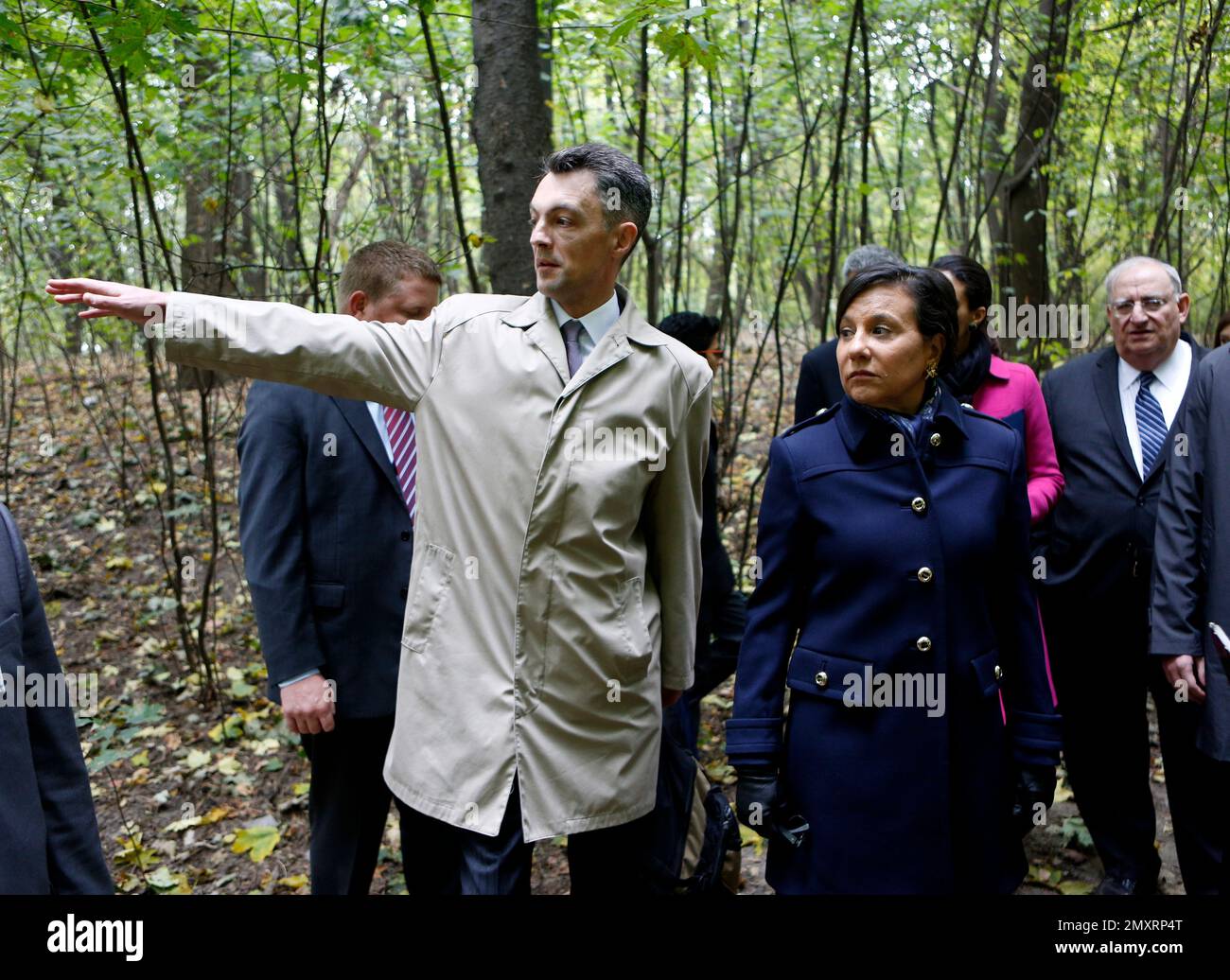 U.S. Commerce Secretary Penny Pritzker, front right, attends a tour in ...