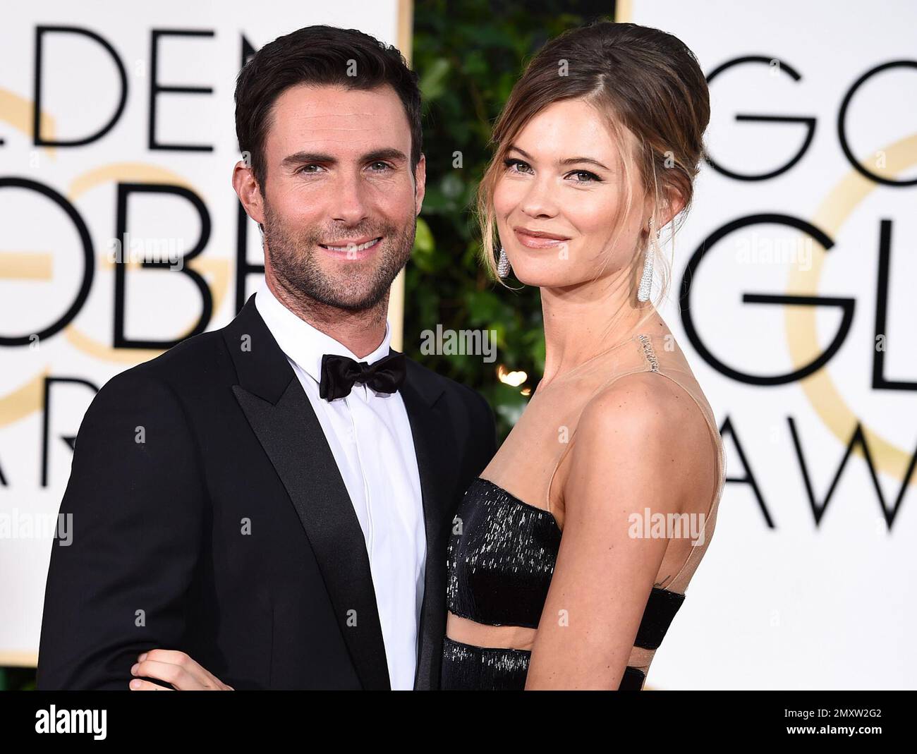 FILE - In this Jan. 11, 2015 file photo, Adam Levine, left, and Behati ...