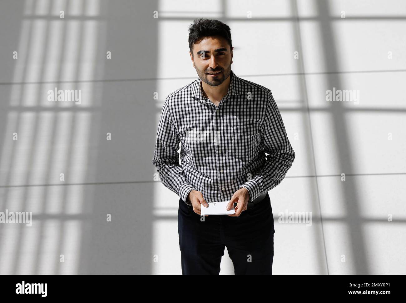 In this Monday, Sept. 12, 2016 photo, Barmak Heshmat poses outside his office at the ...