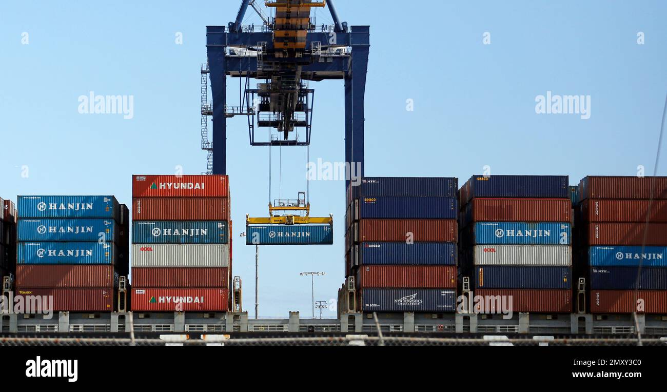 The container ship Hanjin Boston is unloaded at the Port of Los Angeles ...